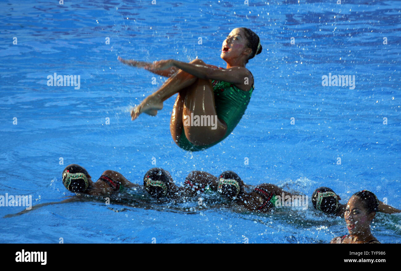 A Japanese swimmer is launched in the free routine combination ...