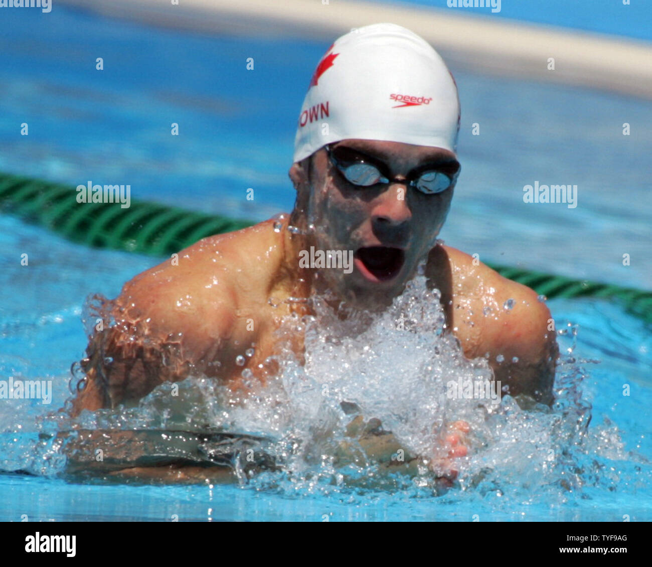 Canadian swimmer Mike Brown swims his qualifying heat in the men's 100 ...