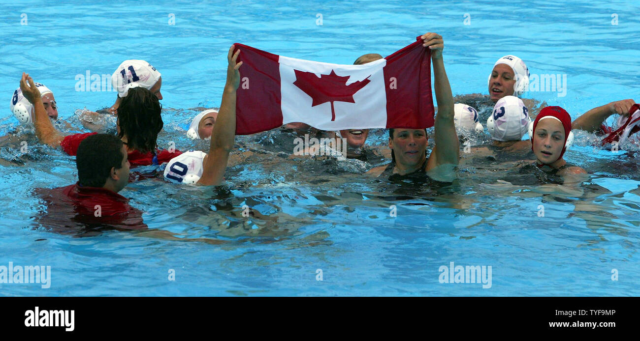 The Canadian women's water polo team celebrates their victory of Russia ...