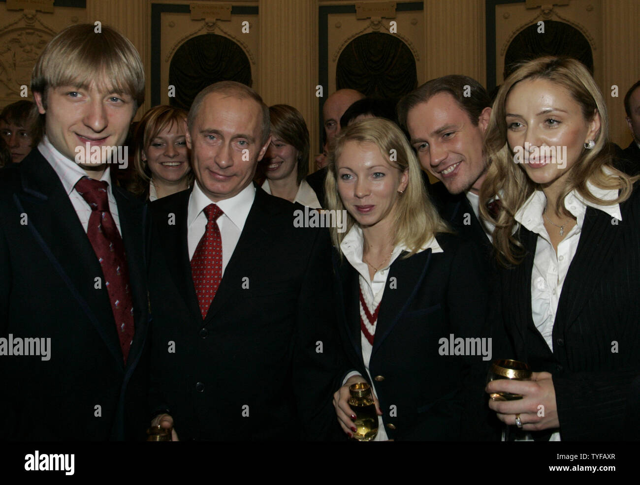 Russian President Vladimir Putin poses with Olympic gold medal winners ...