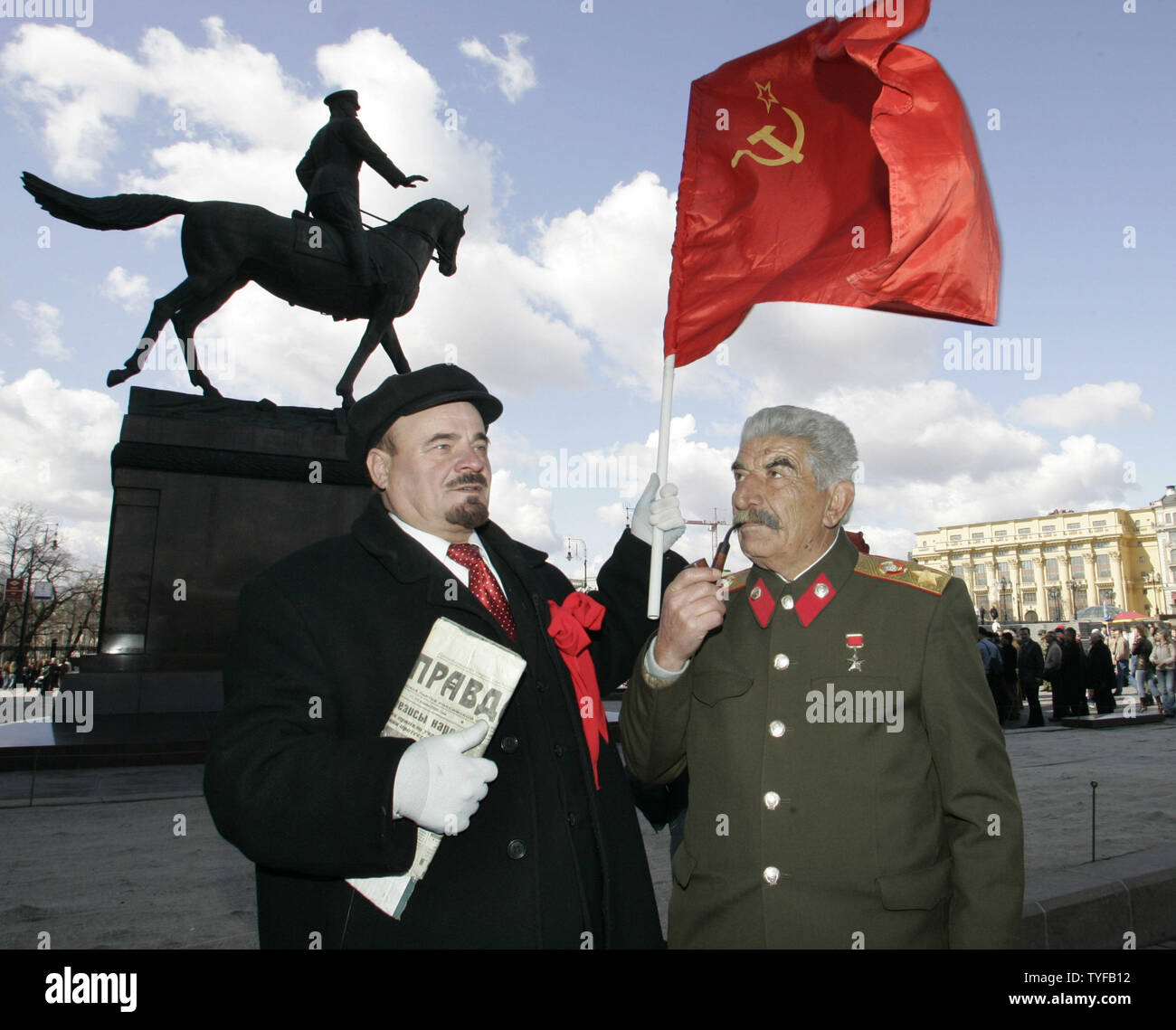 Russian actors dressed as Soviet founder Vladimir Lenin (L) and General ...