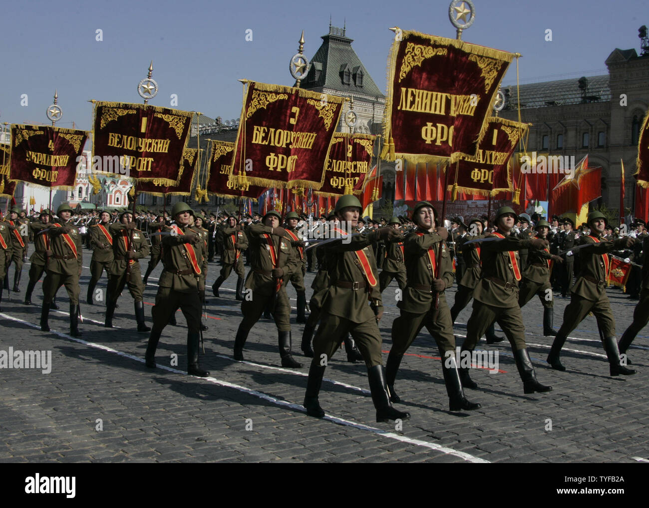 Russian soldiers dressed as Soviet troops in World War II march during ...