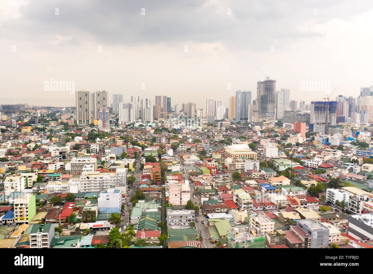 Residential areas and streets of Manila, Philippines, top view. Roofs ...