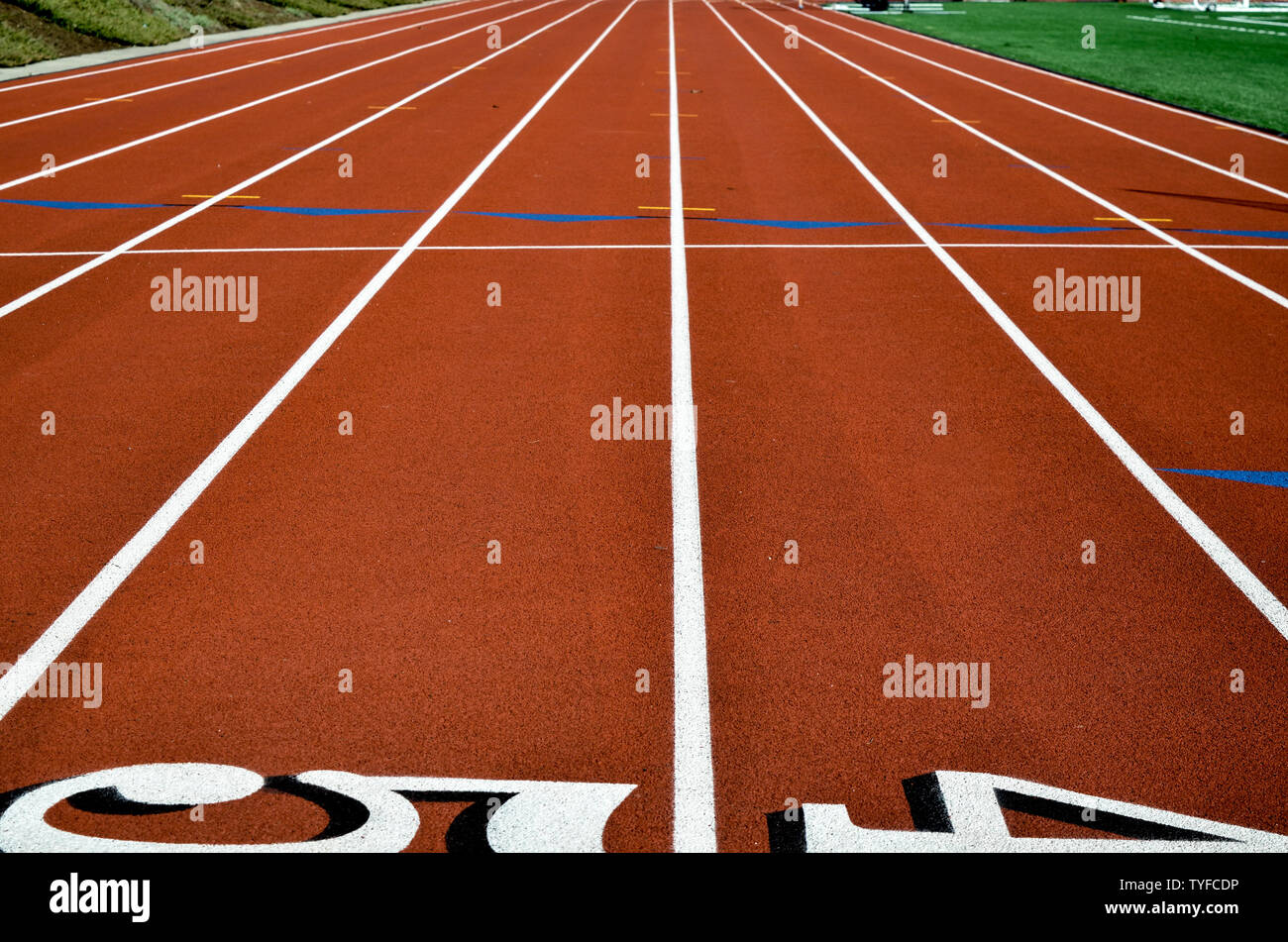 Sports Track orange and white with lines and curves Stock Photo - Alamy