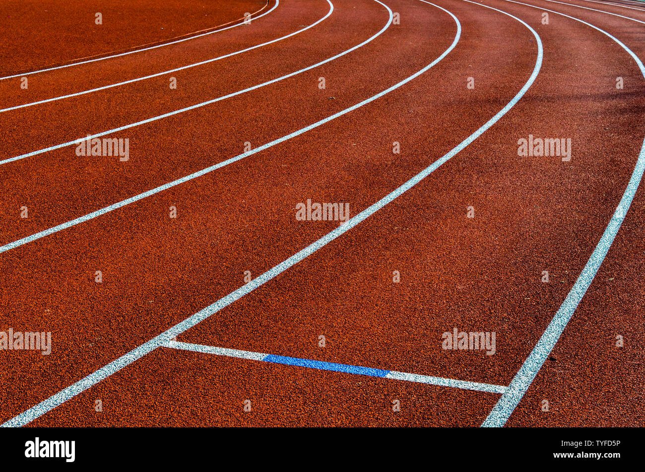 Sports Track orange and white with lines and curves Stock Photo - Alamy