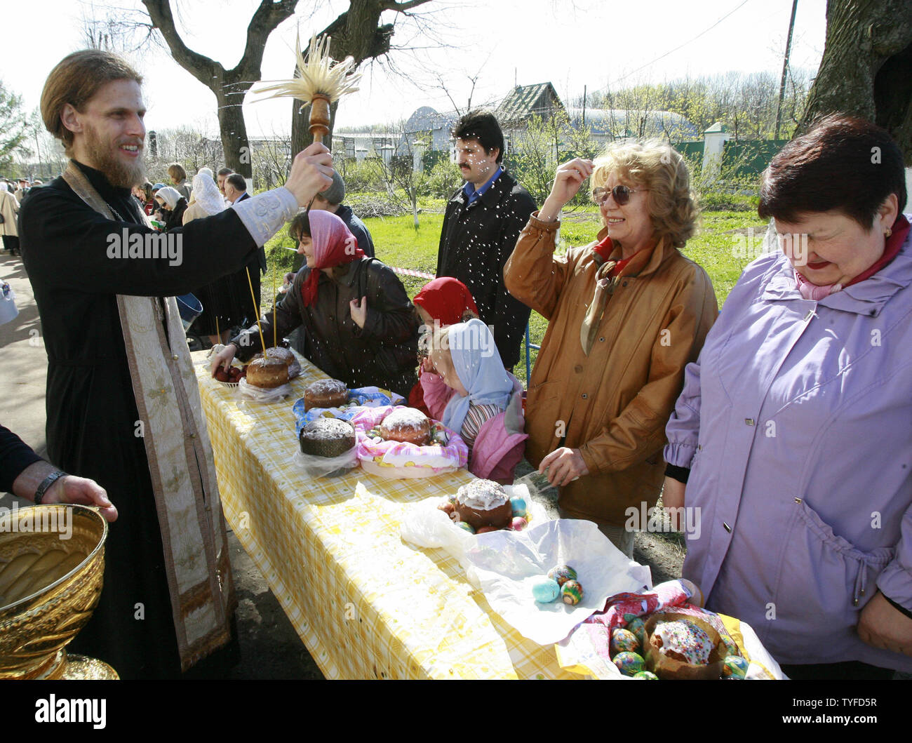 Russian Orthodox priest Pavel blesses traditional Easter cakes and ...