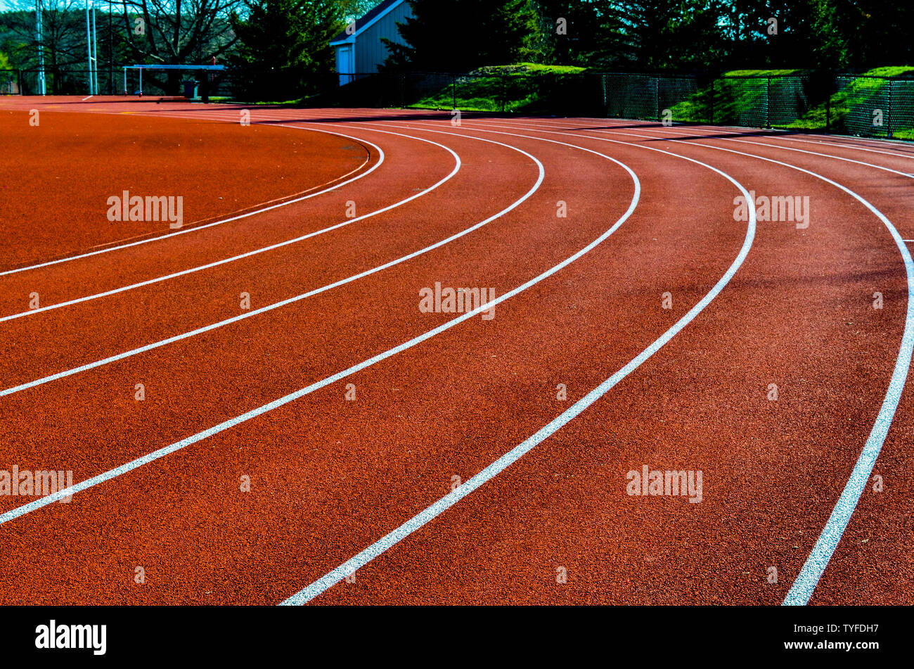 Sports Track orange and white with lines and curves Stock Photo - Alamy