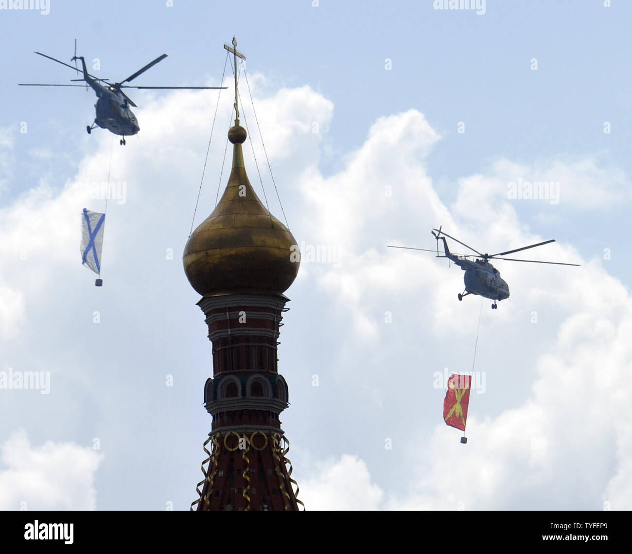 Russian military helicopters fly above Red Square during a military ...