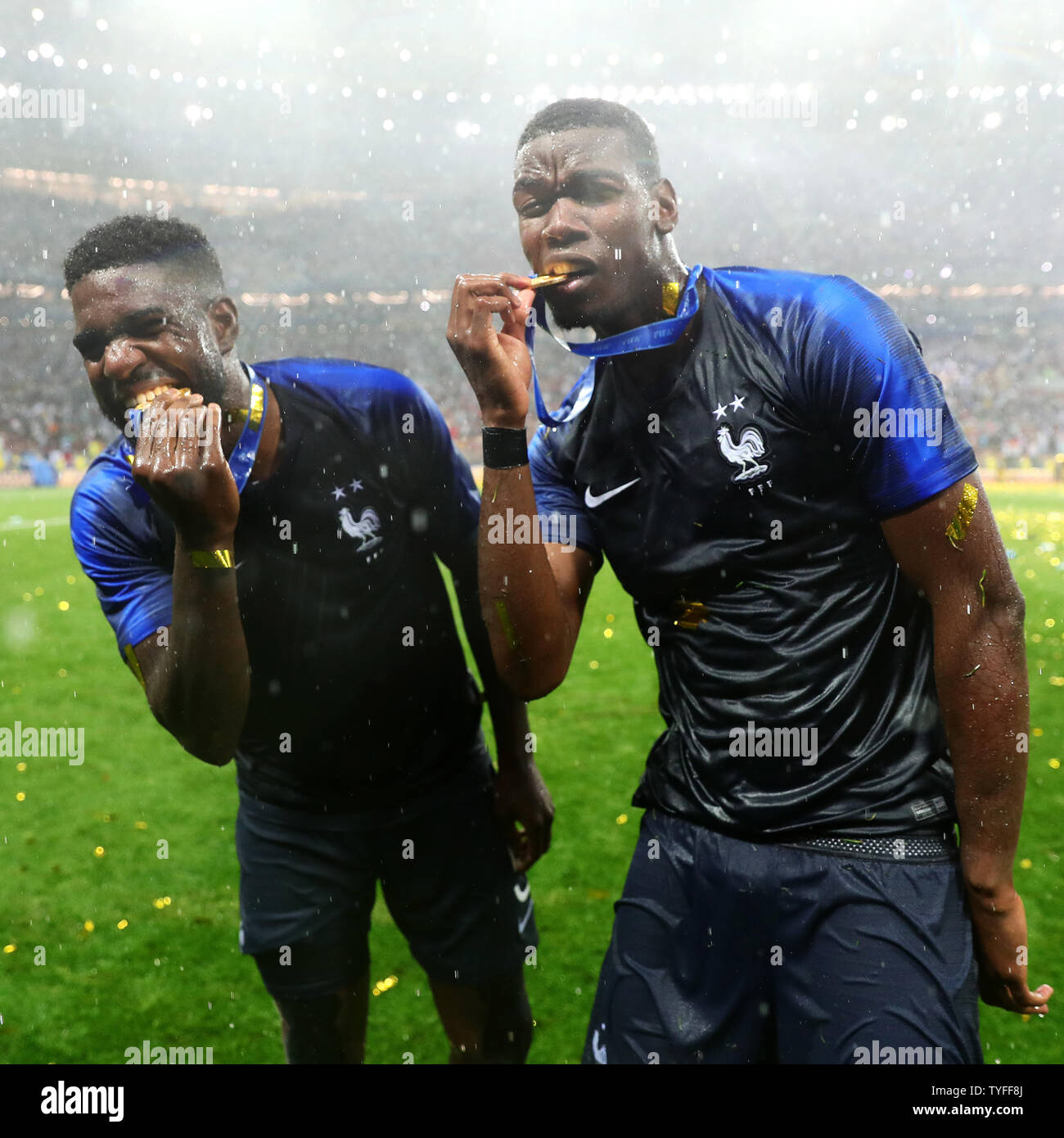 Paul Pogba (R) and Samuel Umtiti of France celebrate following the 2018 ...
