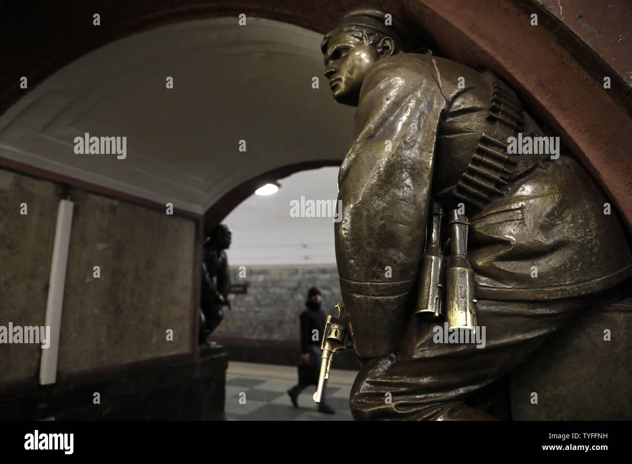 Soviet era sculptures are seen on the platform of Ploshchad Revolyutsii ...