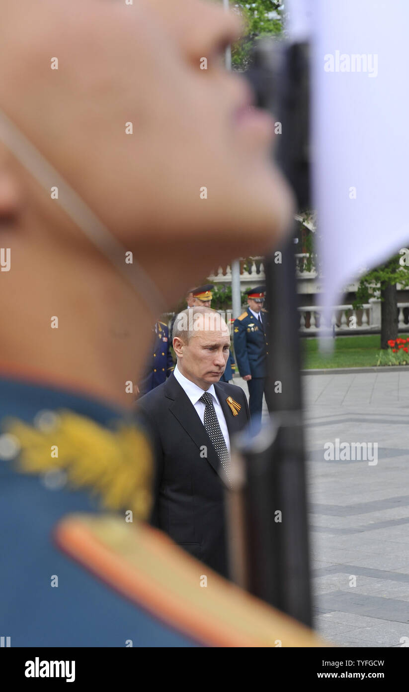 Russian President Vladimir Putin attends a wreath laying ceremony at ...