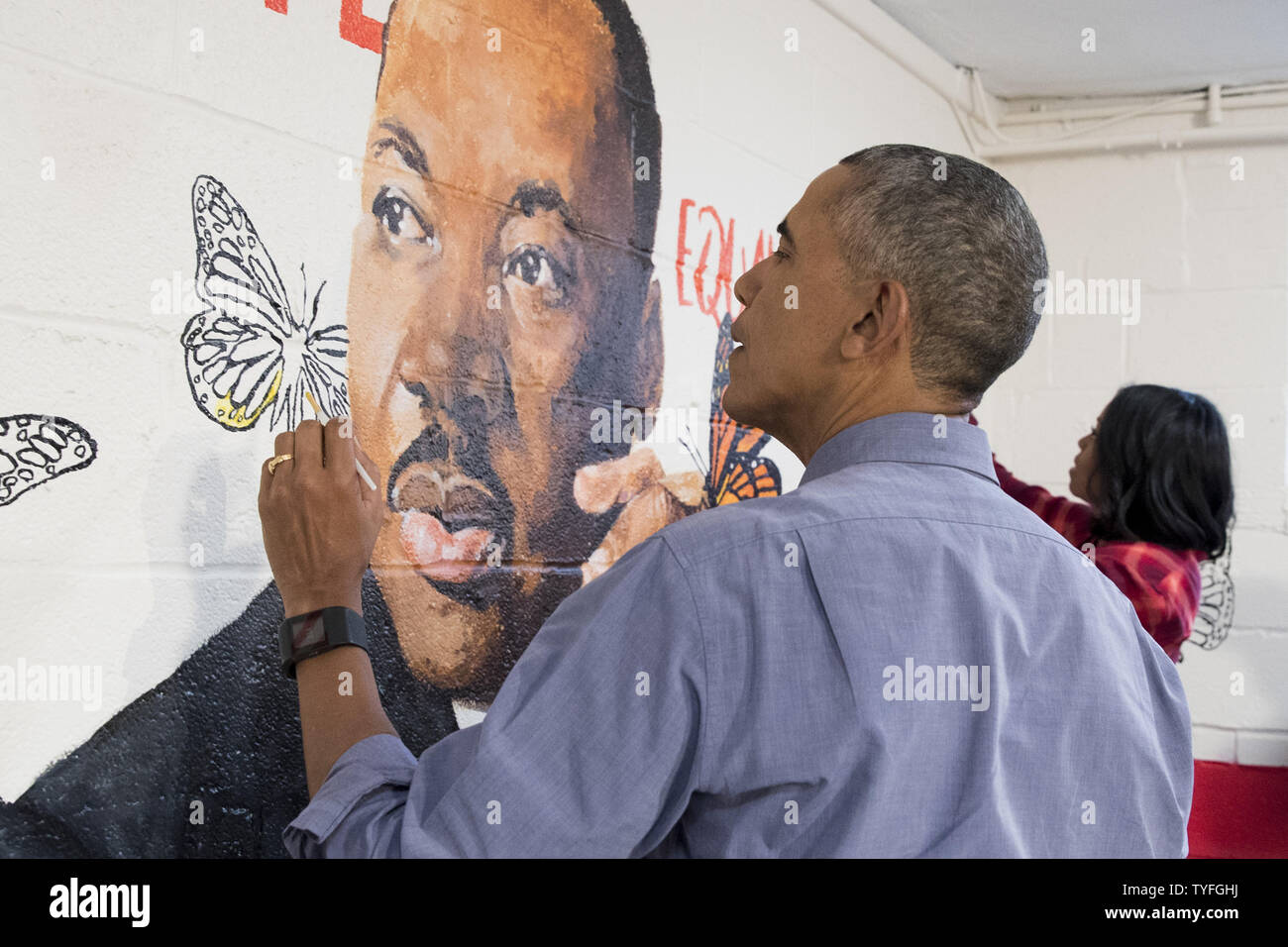US President Barack Obama (Front) and First Lady Michelle Obama (Back ...