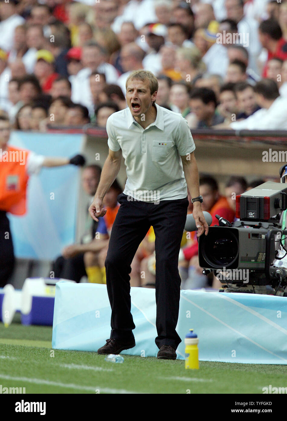 German coach Juergen Klinsmann encourages his team in the World Cup in ...