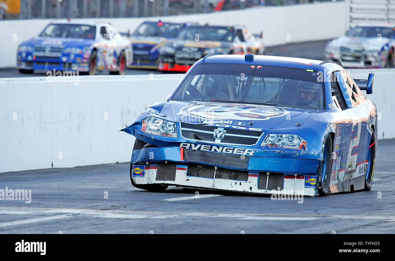 Kurt Busch brings his car down the pit lane during the running of the ...