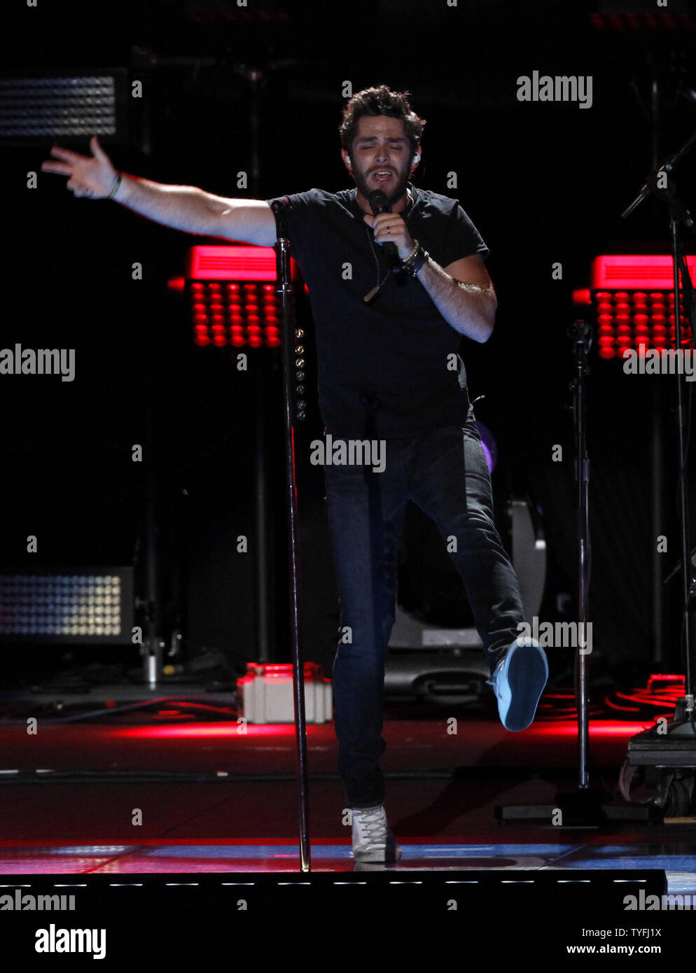 Country music artist Thomas Rhett performs during the CMA Music ...