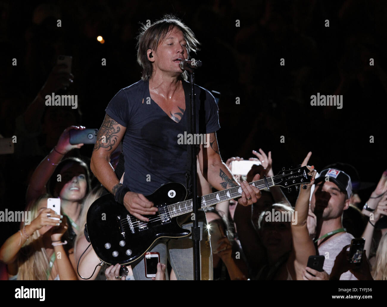 Country music artist Keith Urban performs during the CMA Music Festival ...