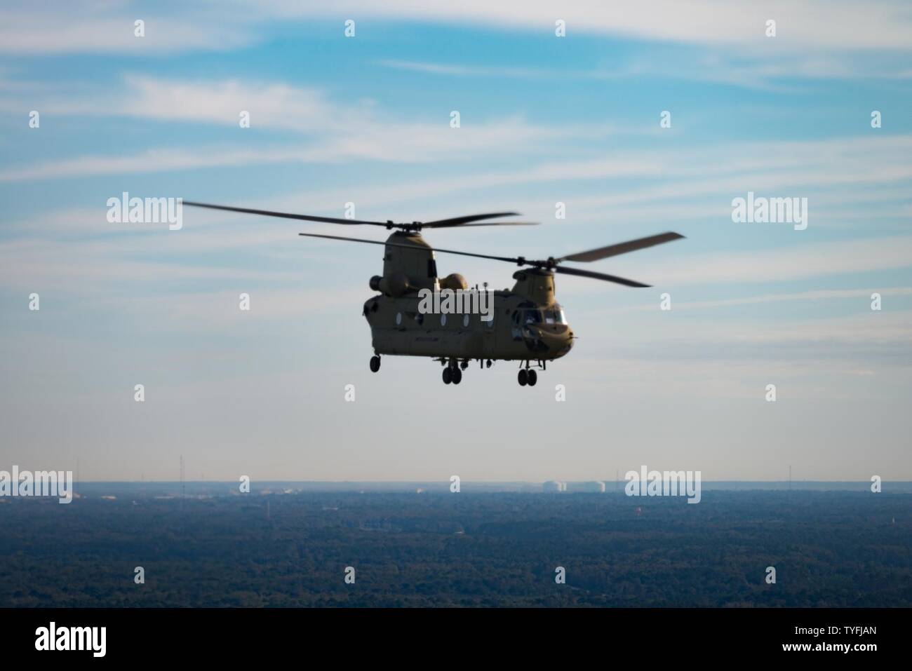 A U.S. Army Chinook maneuvers from Hunter Army Airfield to Fort Stewart ...