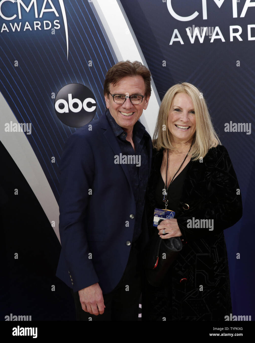 Dann Huff and quest arrive on the red carpet at the 52nd Annual Country ...