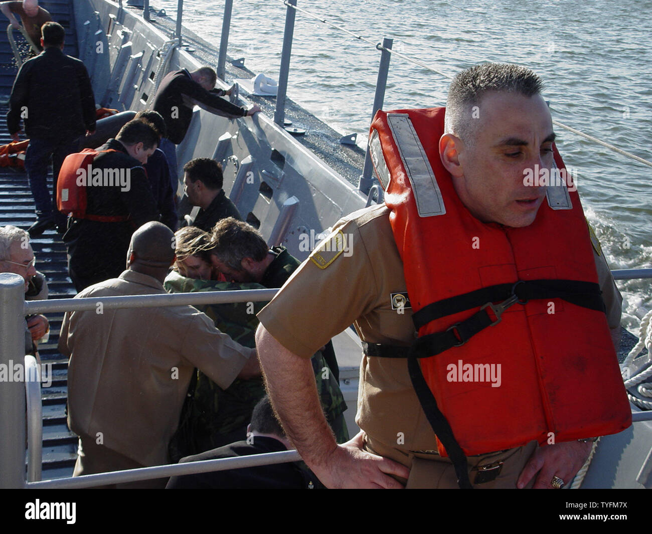 Passengers of the capsized water-taxi are are provided blankets and ...