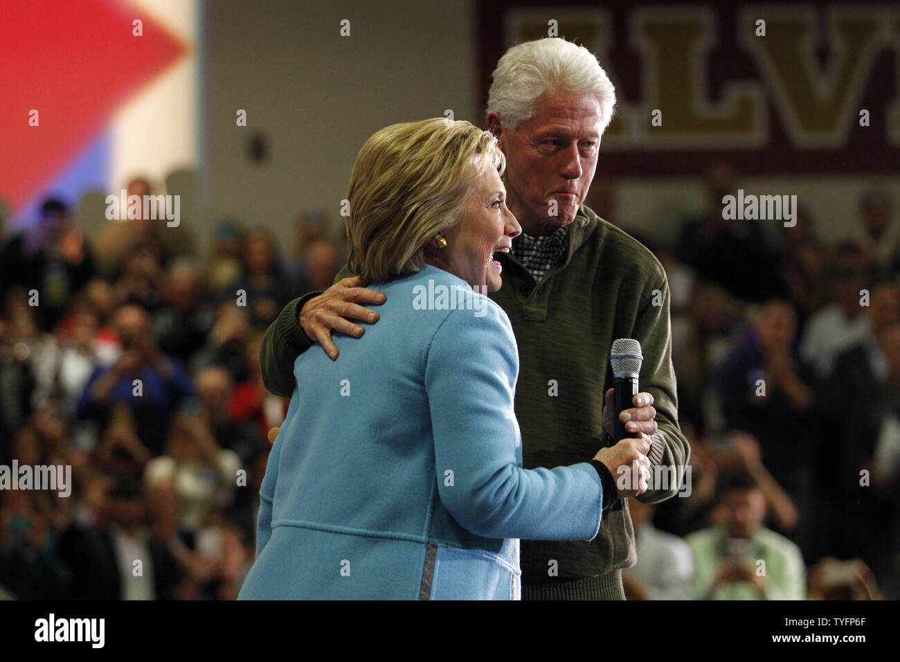 Democratic Presidential Candidate, Hillary Clinton (L) gets a hug from ...
