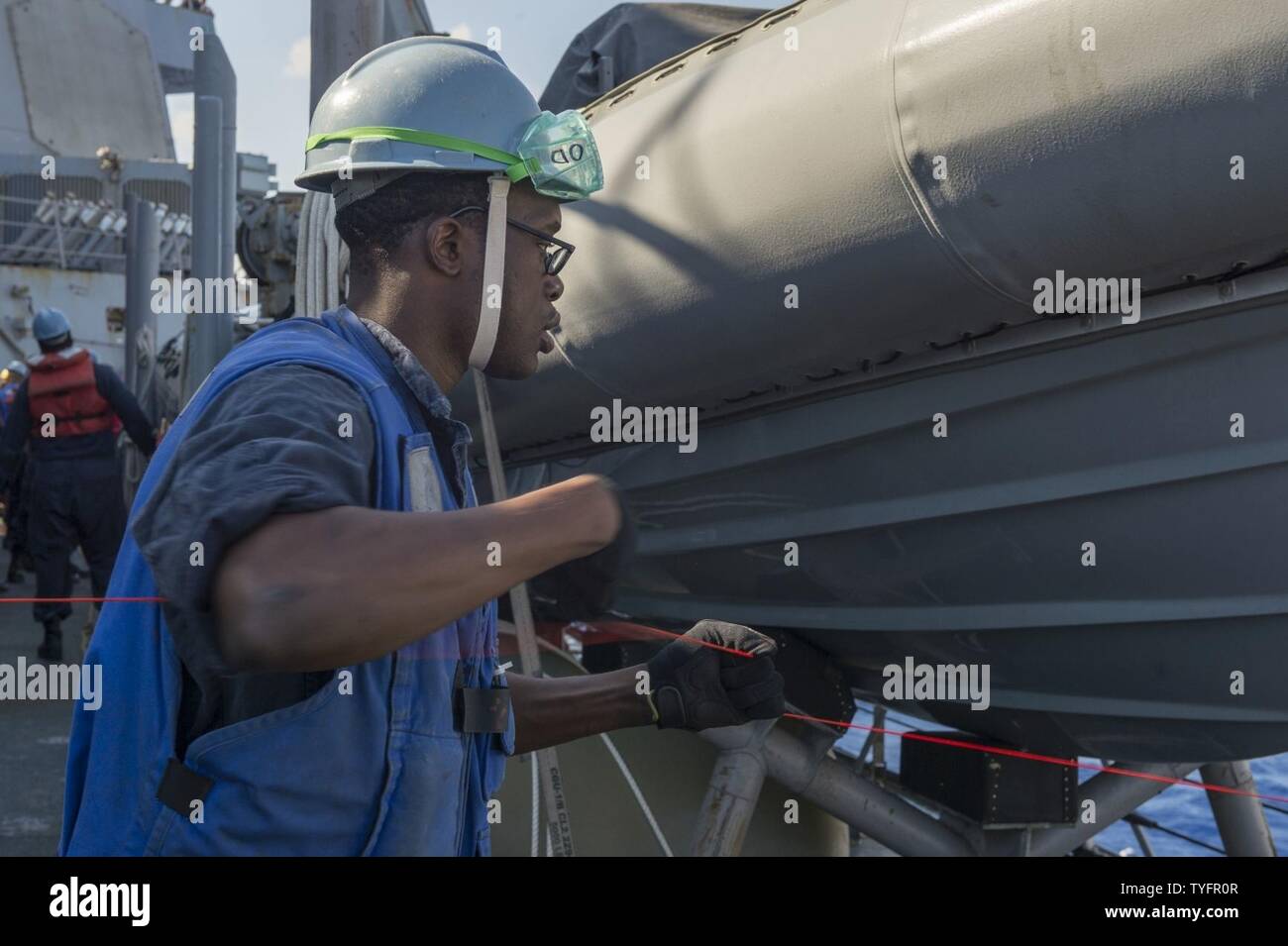 SEA (Nov. 6, 2016) Petty Officer 2nd Class Durell Graham pulls the ...