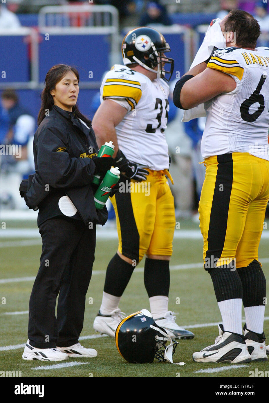 Pittsburgh Steelers assistant trainer Ariko Iso brings water on the ...