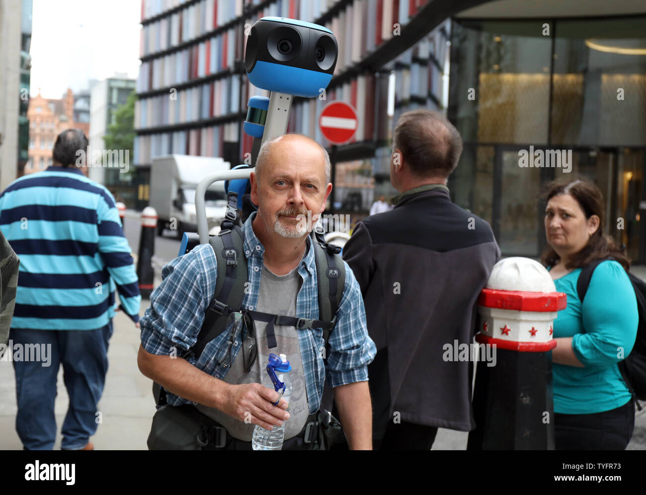 google street view walker trekker Stock Photo - Alamy