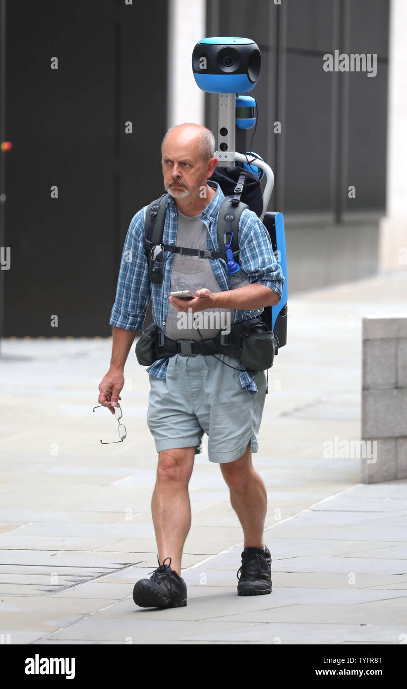 google street view walker trekker Stock Photo - Alamy