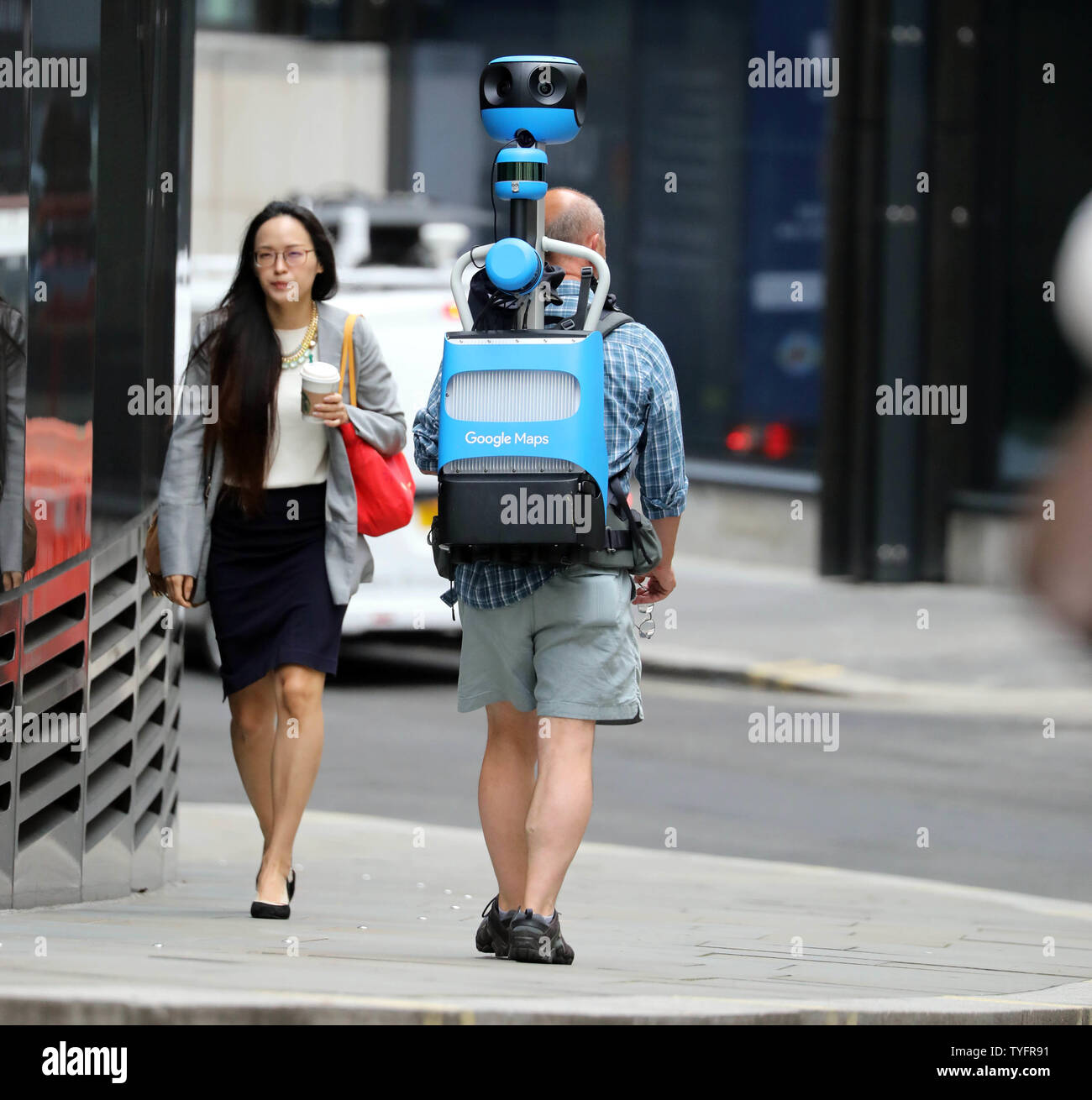 google street view walker trekker Stock Photo - Alamy