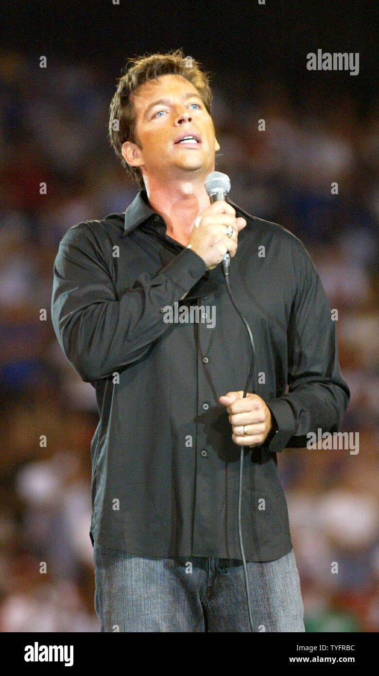 Harry Conic Jr. performs before the game. The New York Giants hosted ...