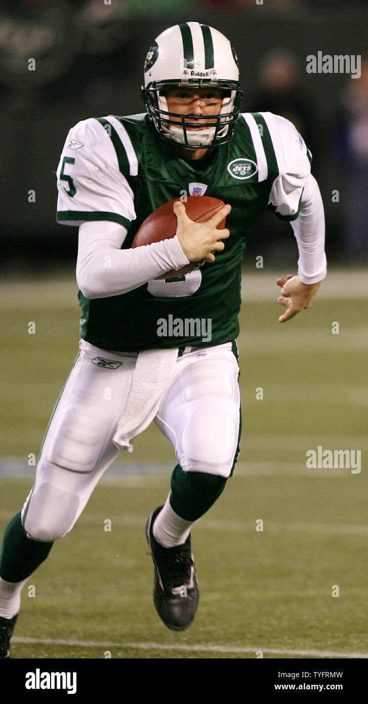 New York Jets quarterback Brooks Bollinger runs out of the pocket ...