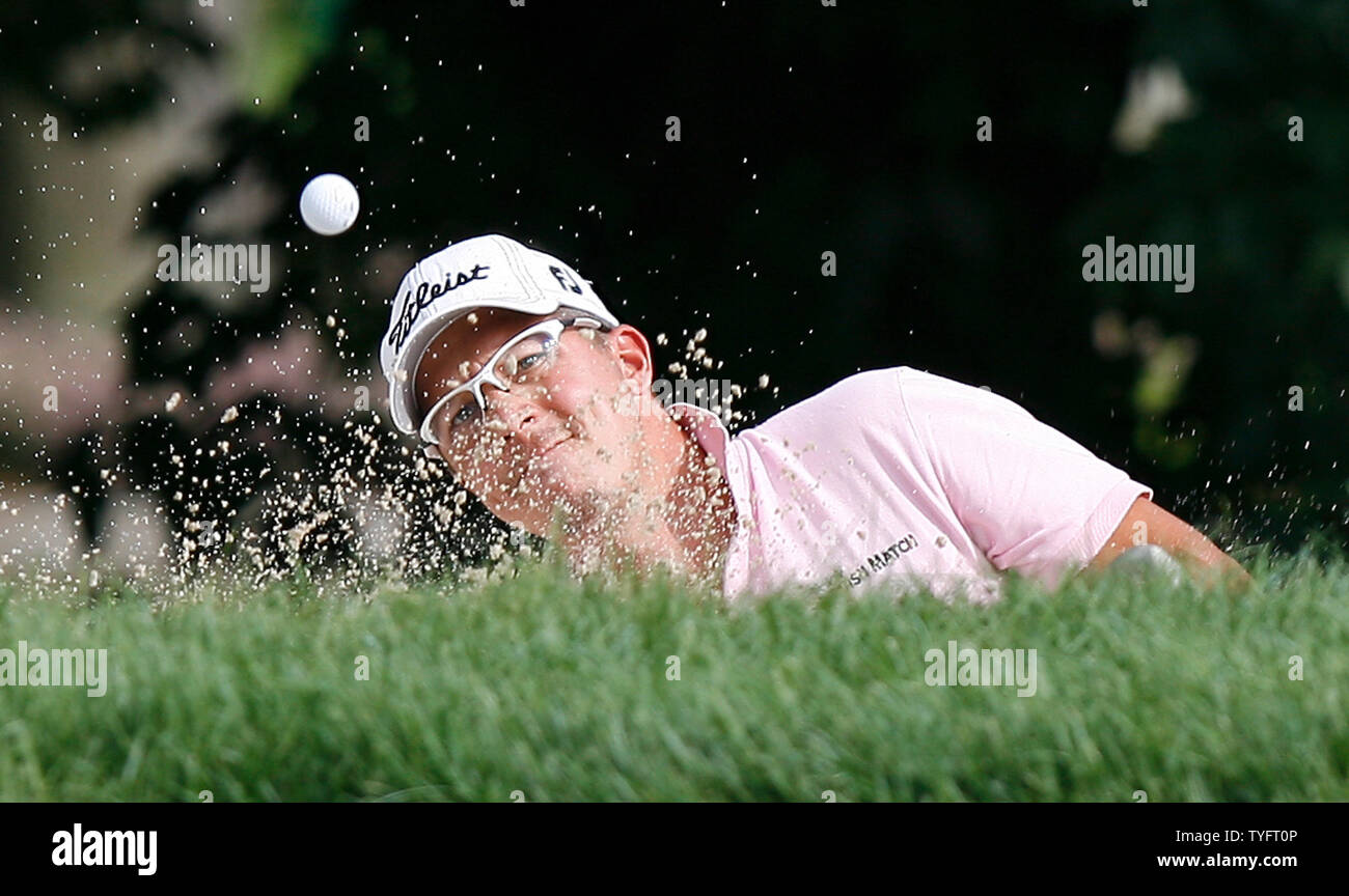 Fredrik Jacobson hits out of the bunker on his 18th hole of the day in ...