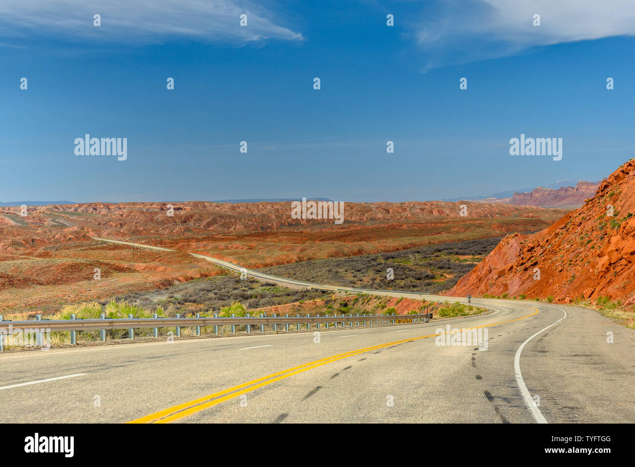 Highway through Utah desert Stock Photo - Alamy