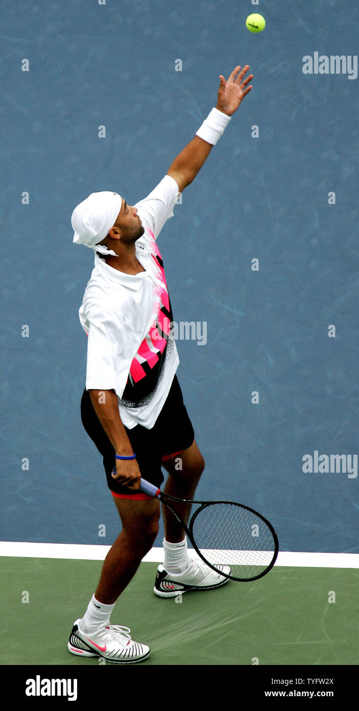 James Blake (USA), who is seeded fifth, serves the ball to Teimuraz ...