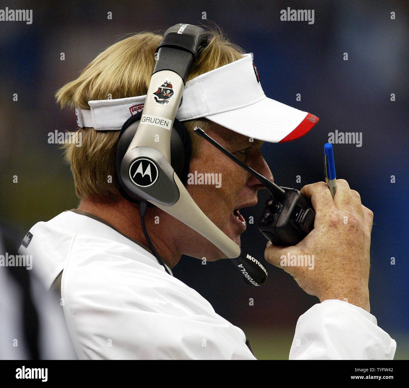 Tampa Bay Buccaneers head coach Jon Gruden yells into the microphone on ...