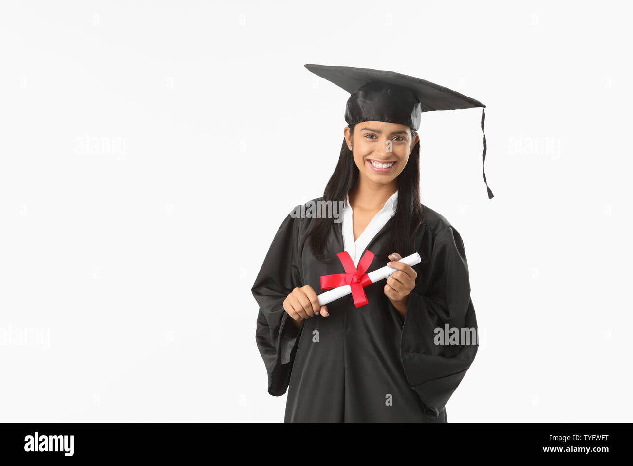 University student holding graduation degree Stock Photo - Alamy