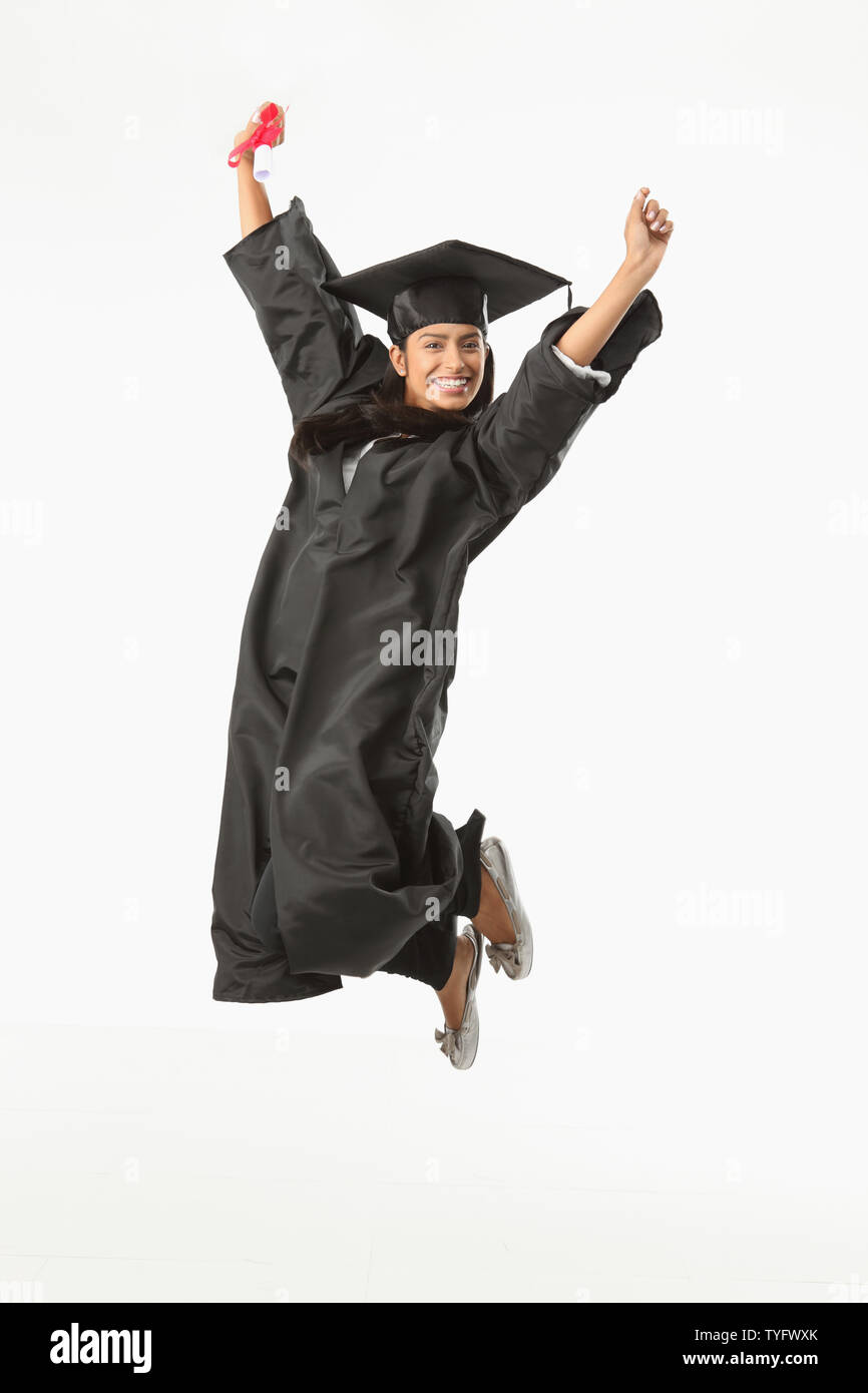 University student holding graduation degree Stock Photo - Alamy