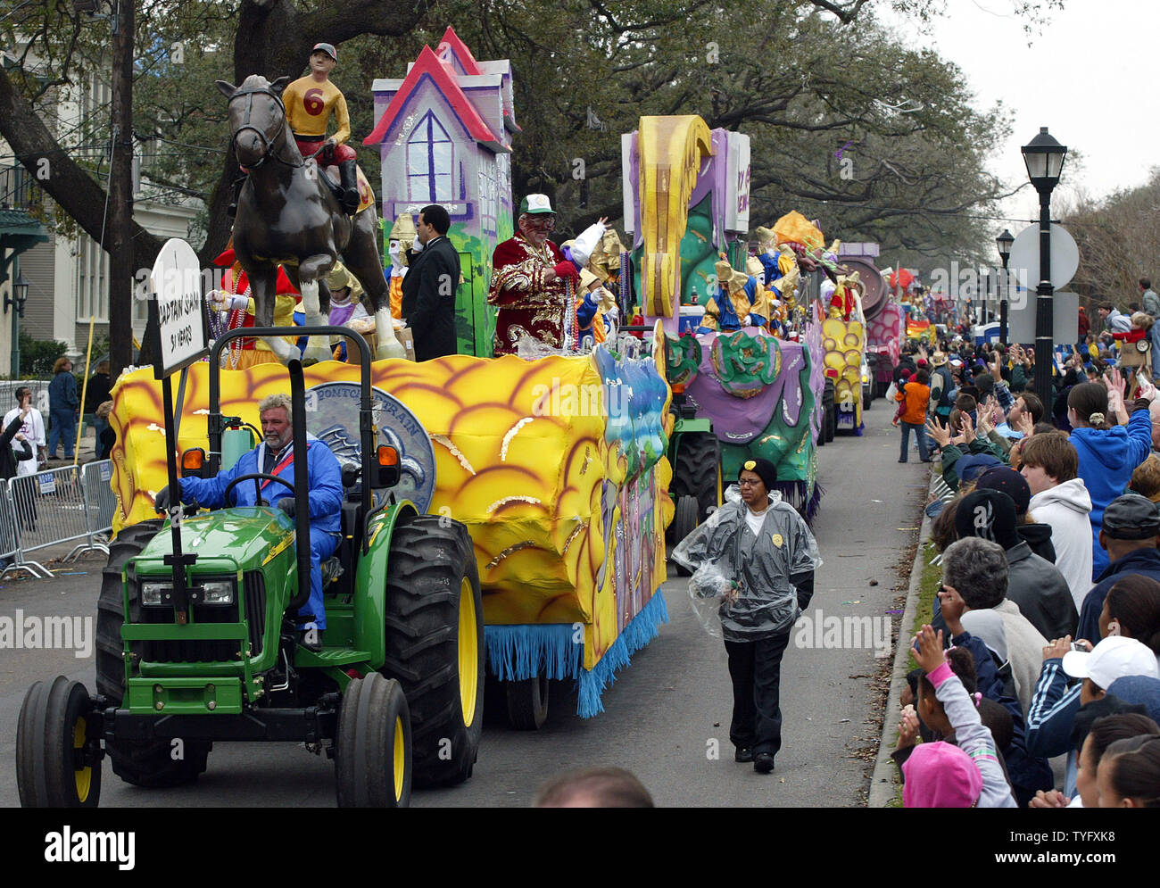 Crowds cheer for the Krewe of Pegasus parade in Uptown New Orleans ...