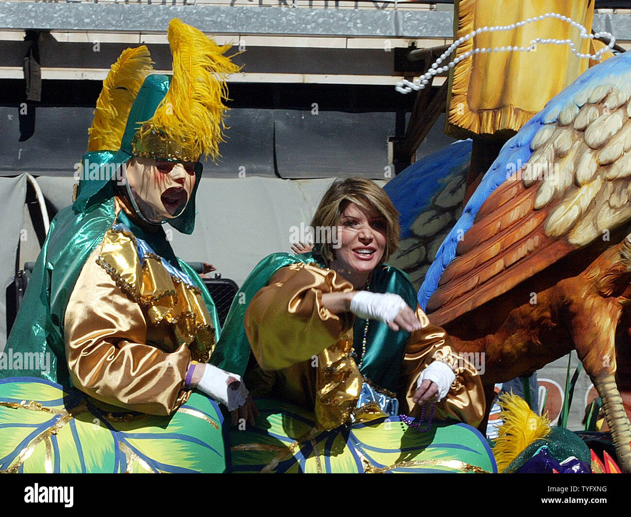 CNN correspondent Susan Roesgen tosses beads to the crowd on Bourbon ...