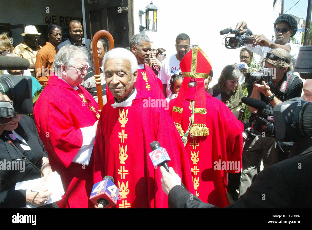 The Rev. Jerome LeDoux answers questions after Mass at St. Augustine ...