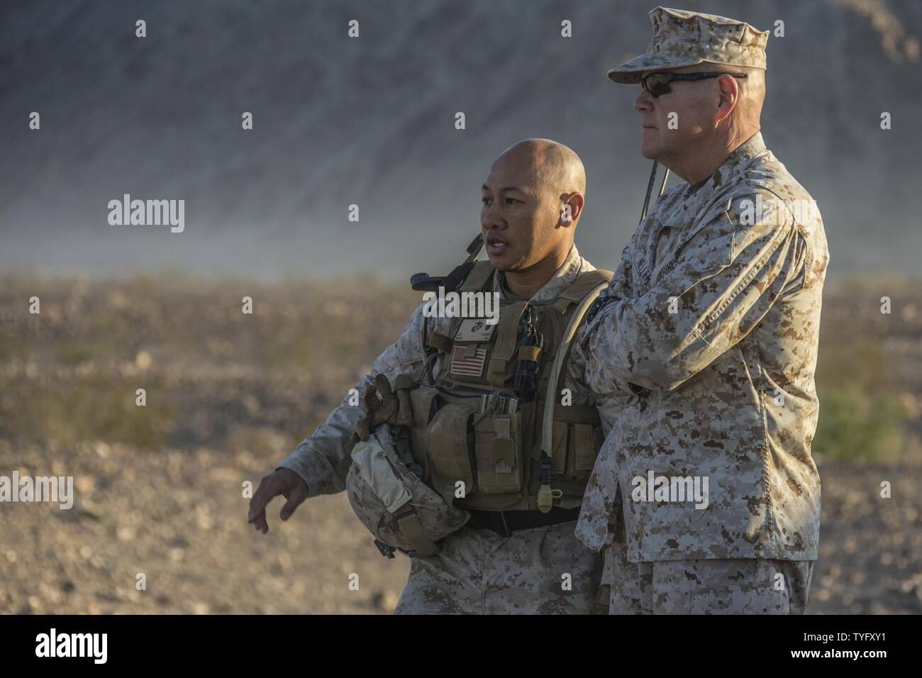 Commandant of the Marine Corps Gen. Robert B. Neller, right, speaks ...
