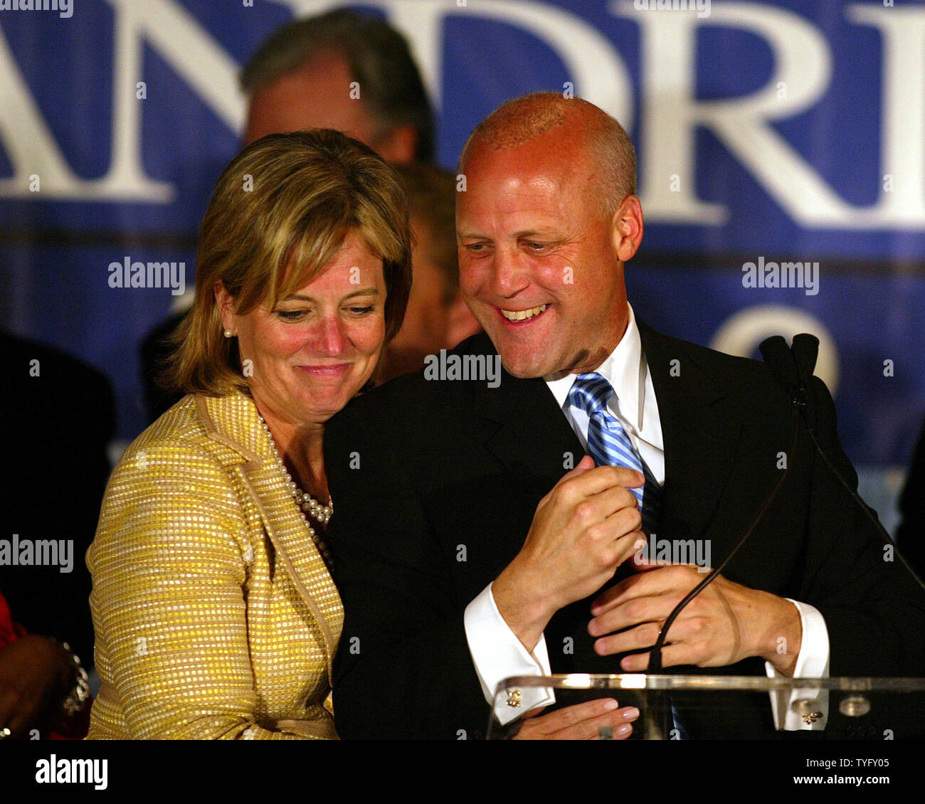 Louisiana Lt. Gov. Mitch Landrieu and his wife, Cheryl, take the podium ...