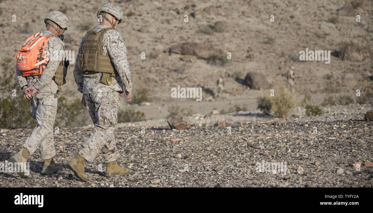 Commandant of the Marine Corps Gen. Robert B. Neller, right, walks with ...
