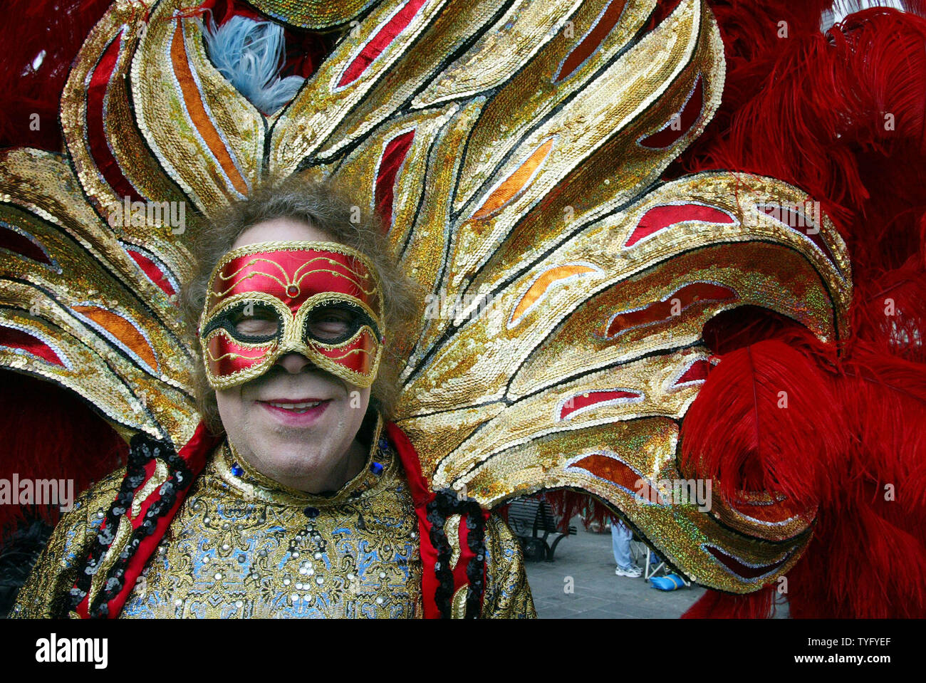 Robert Detrinis of New Orleans walks through Jackson Square with a head ...