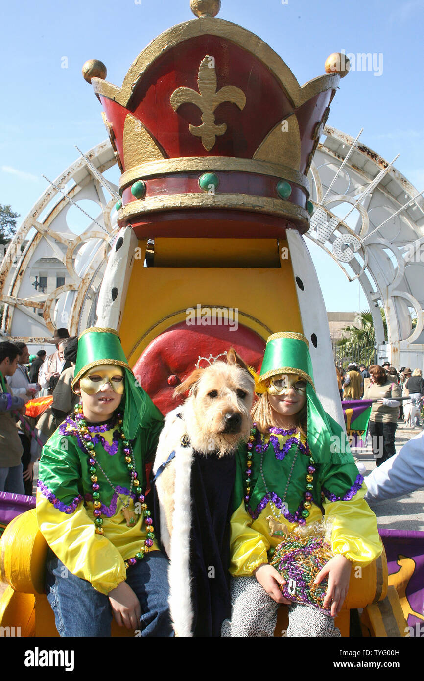 Siblings Julian, left, and Gabrielle Charron, pose with their dog ...
