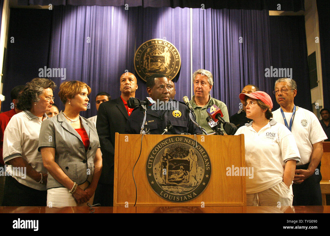 New Orleans Police Chief Warren Riley, center, is flanked by Mayor Ray ...