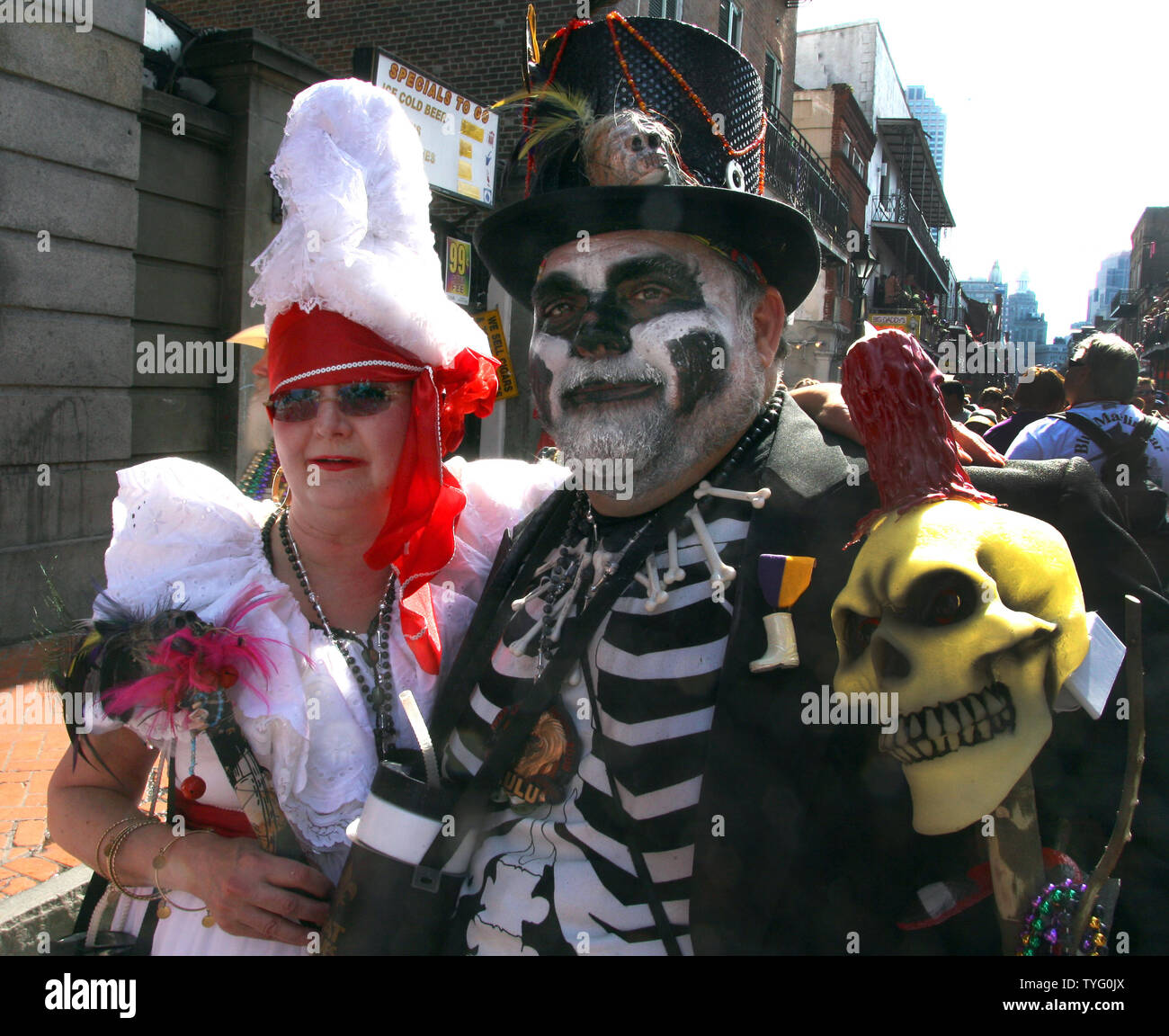 Susan and Herrin Guidry of New Orleans mask as voodoo queen Marie ...