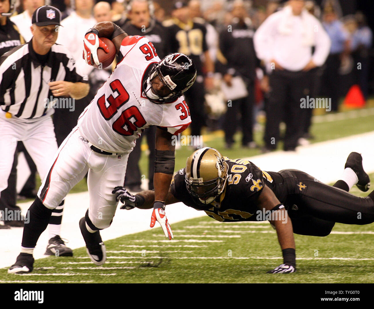Atlanta Falcons fullback Verron Haynes (36) is knocked out of bounds by ...