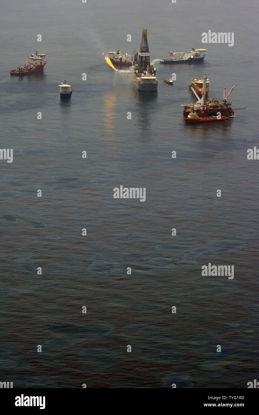 Workboats surround the Transocean Discoverer Enterprise drill ship ...