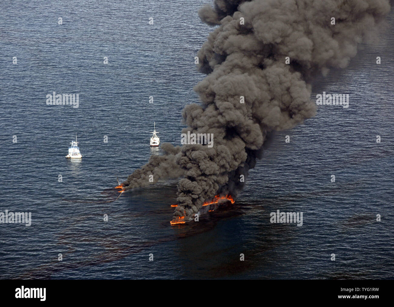 Oil and gas are burned off at the BP Deepwater Horizon oil spill site ...